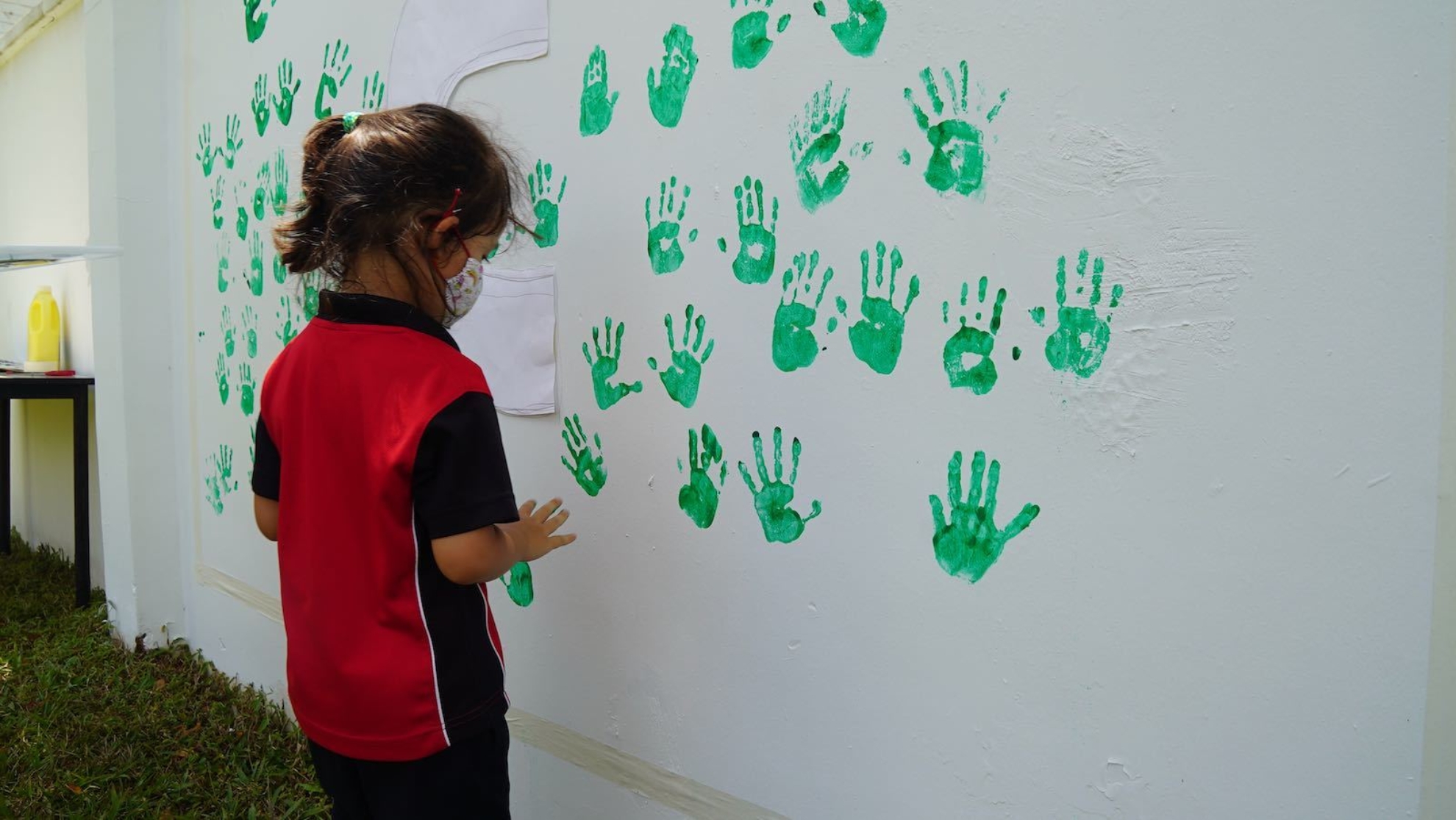 TK's handprint mural | CIS Mosaic