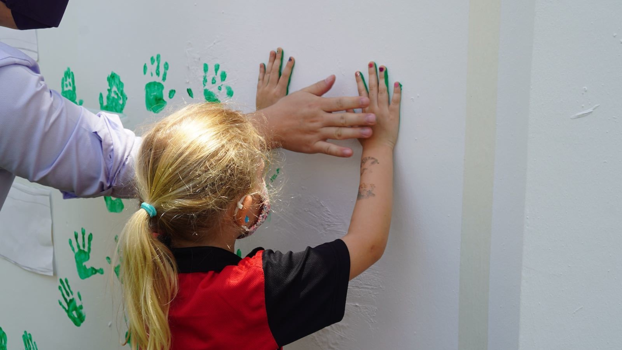 TK's handprint mural | CIS Mosaic