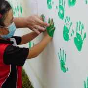 TK's handprint mural | CIS Mosaic