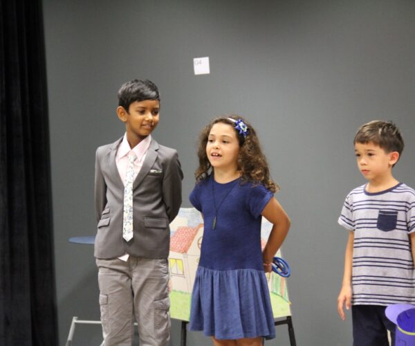 Primary French plays in mini theatre. | CIS Mosaic