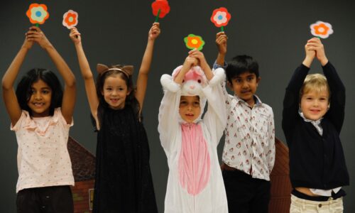 Primary French plays in mini theatre. | CIS Mosaic